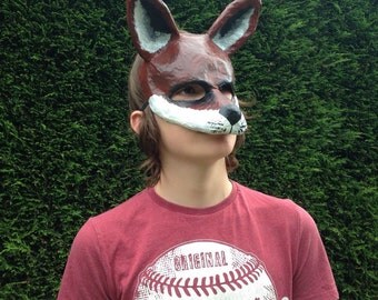 Paper mache masks and sculptures inspired by by MrPolskysMenagerie