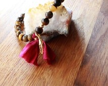 Popular items for gold dipped feathers on Etsy