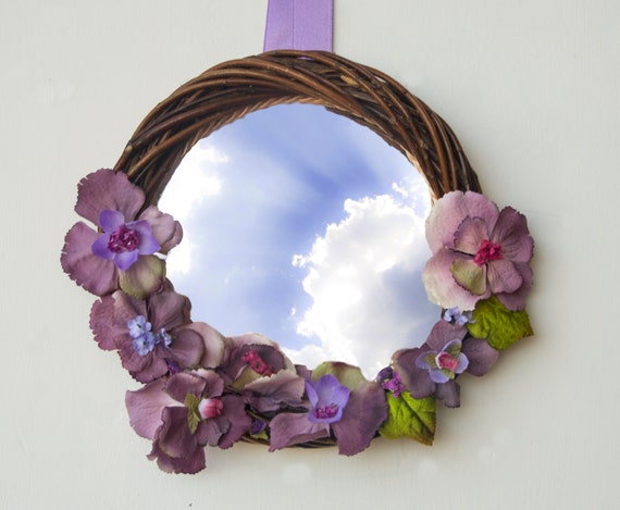 Round mirror decorated with flowers round mirror by Ghirlandiamo