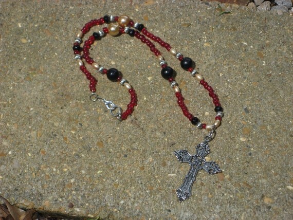 Items similar to beaded necklace with metal cross pendant on Etsy