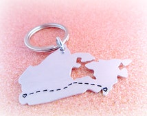 Popular items for canada keychain on Etsy