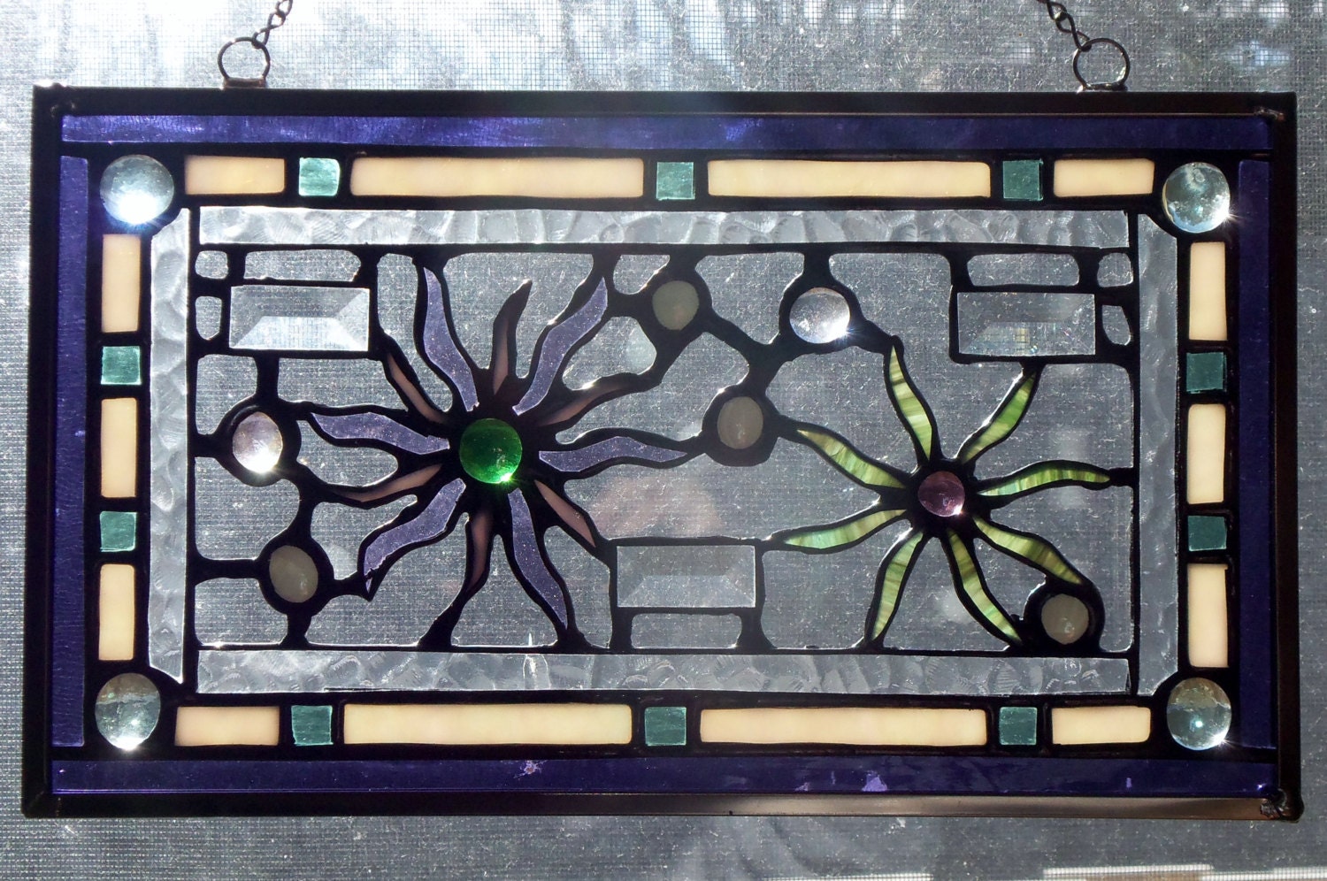 Purple and green flower stained glass window hanging