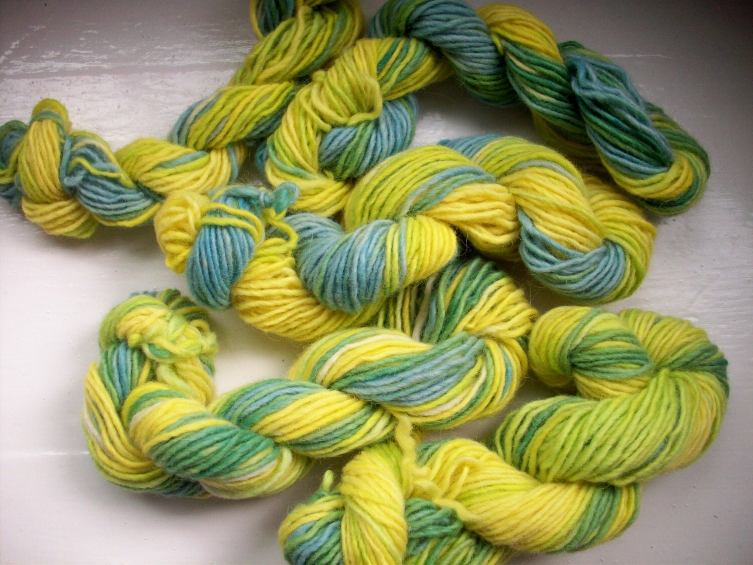 Hand dyed wool blue yellow green aran weight by SpinningStreak