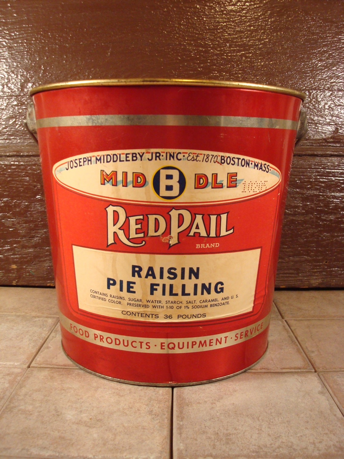 Large red vintage industrial advertising metal pail with a metal and ...