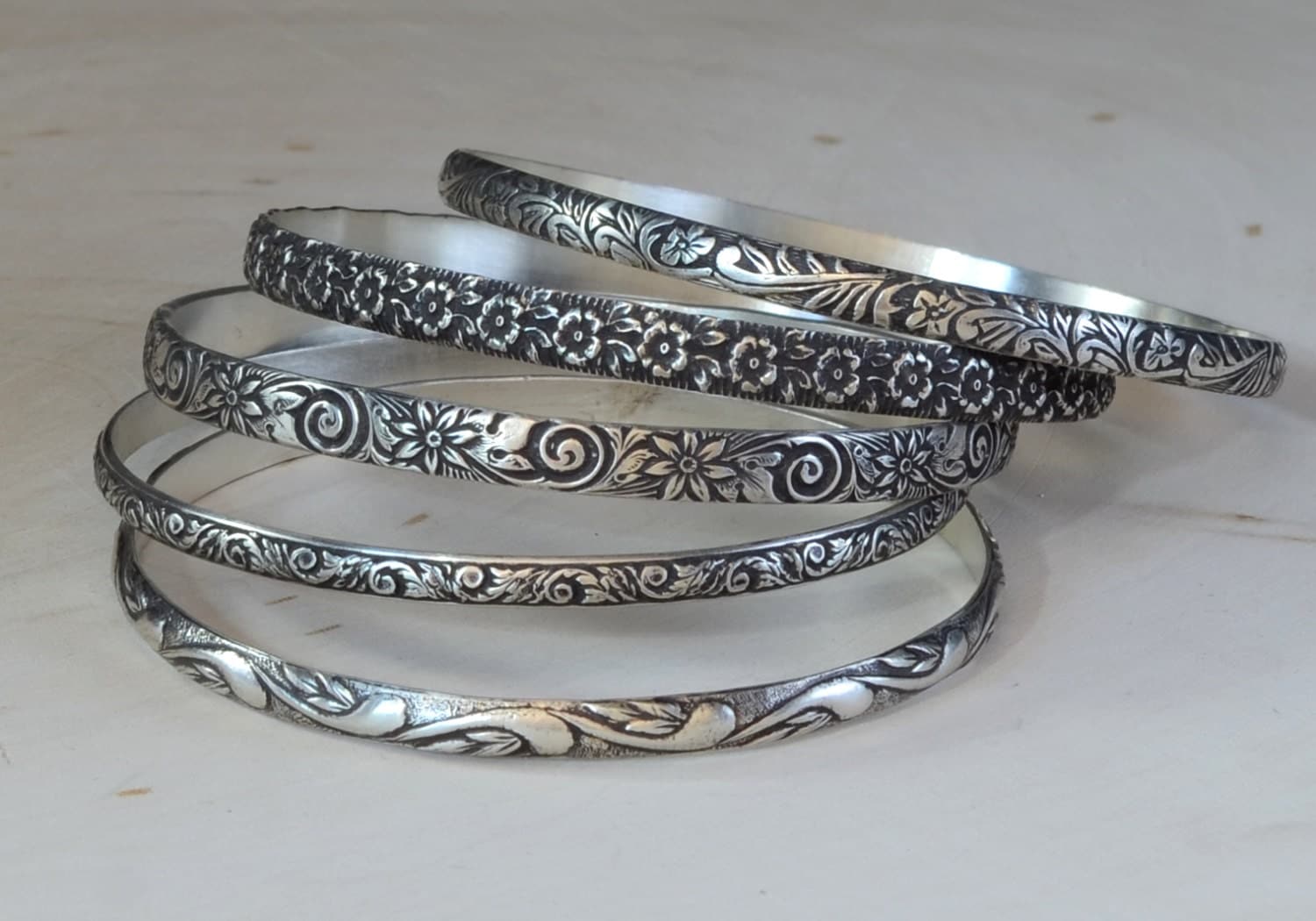 Sterling Silver Stackable Bangle Set Featuring by NiciLaskin