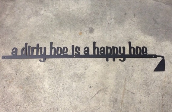 Metal a dirty hoe is a happy hoe Garden Sign