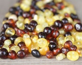 Unique amber beads related items | Etsy