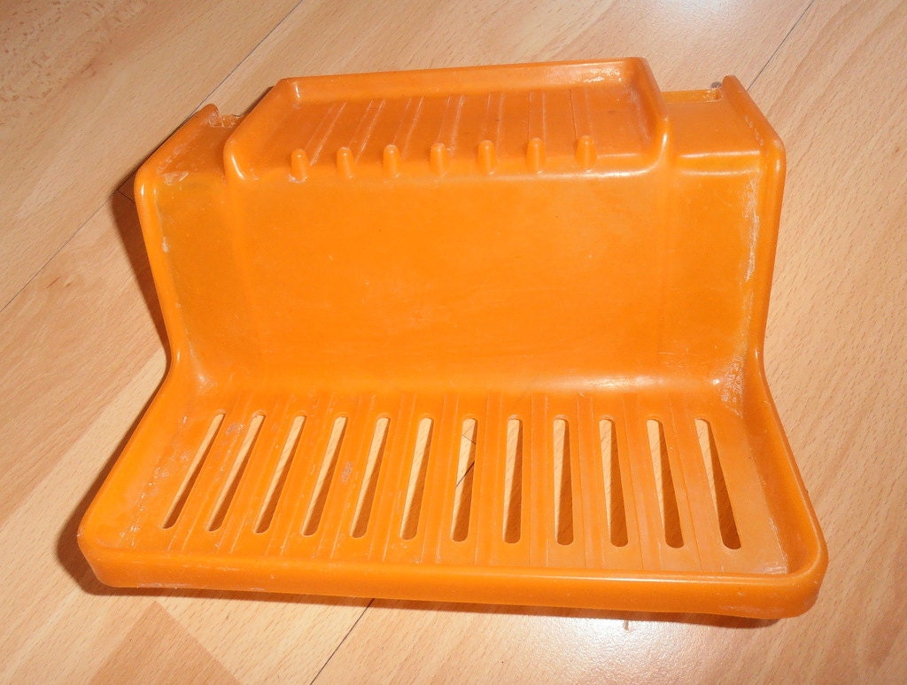 Vintage Soviet plastic bathroom shelf with hooks.Orange plastic shelf ...