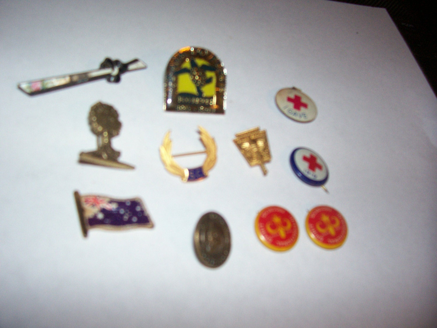 10 service pins and 1 antique enamel bar pin – Haute Juice