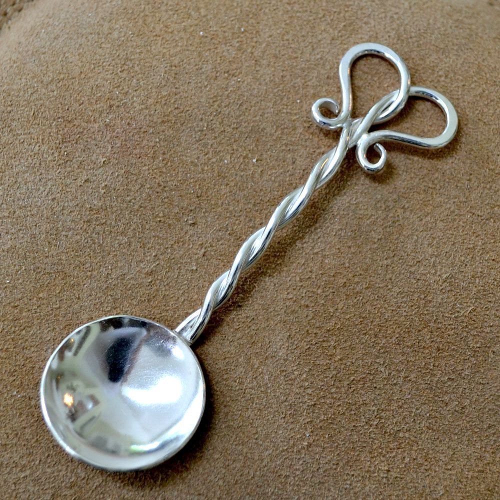 Sterling Silver baby spoon. 1/2 teaspoon measure and 4 inches