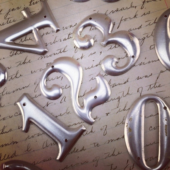 Industrial metal numbers 2 small vintage metal numbers