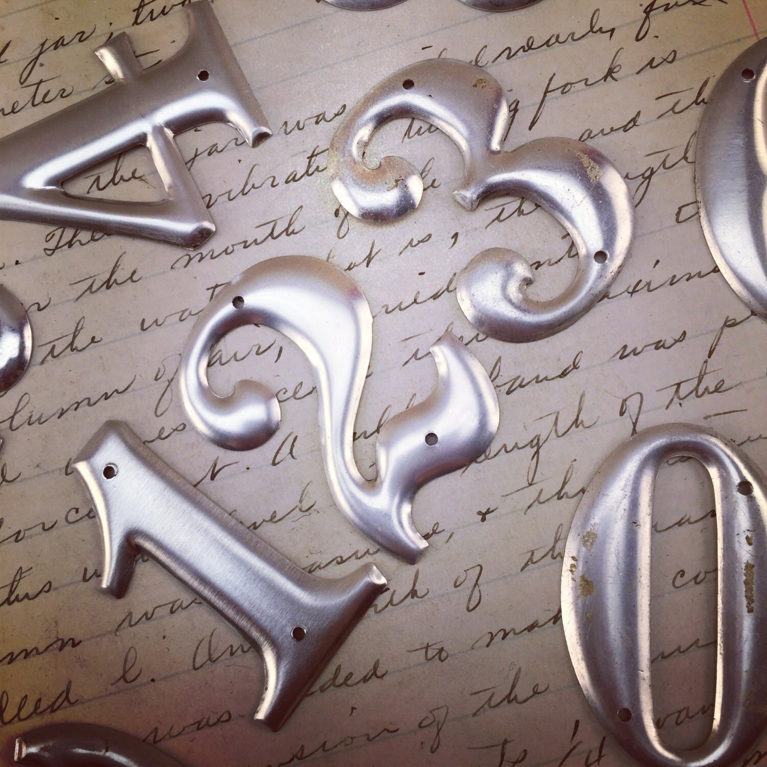 Industrial metal numbers 2 small vintage metal numbers