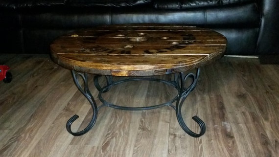 Items similar to Reclaimed spool pallet coffee table on decorative ...