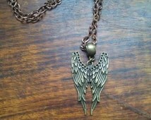 Popular items for angel wing necklace on Etsy