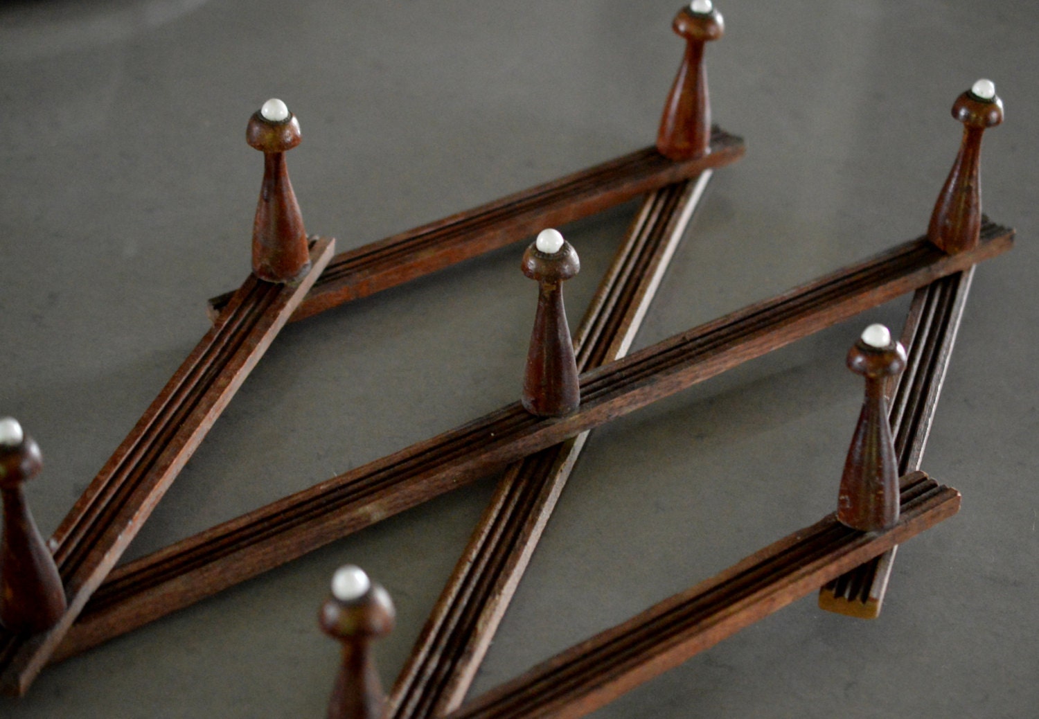 Vintage Accordion Expandable Peg Wall Rack Porcelain Tips – Haute Juice