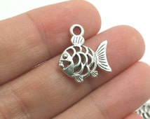 Popular items for fishing charms on Etsy