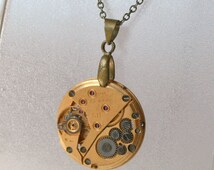 Unique clockwork necklace related items | Etsy