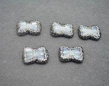 Unique crystal bow pendant related items | Etsy