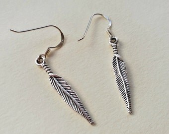 Feather earrings | Etsy