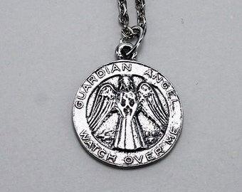 Angel medallion | Etsy