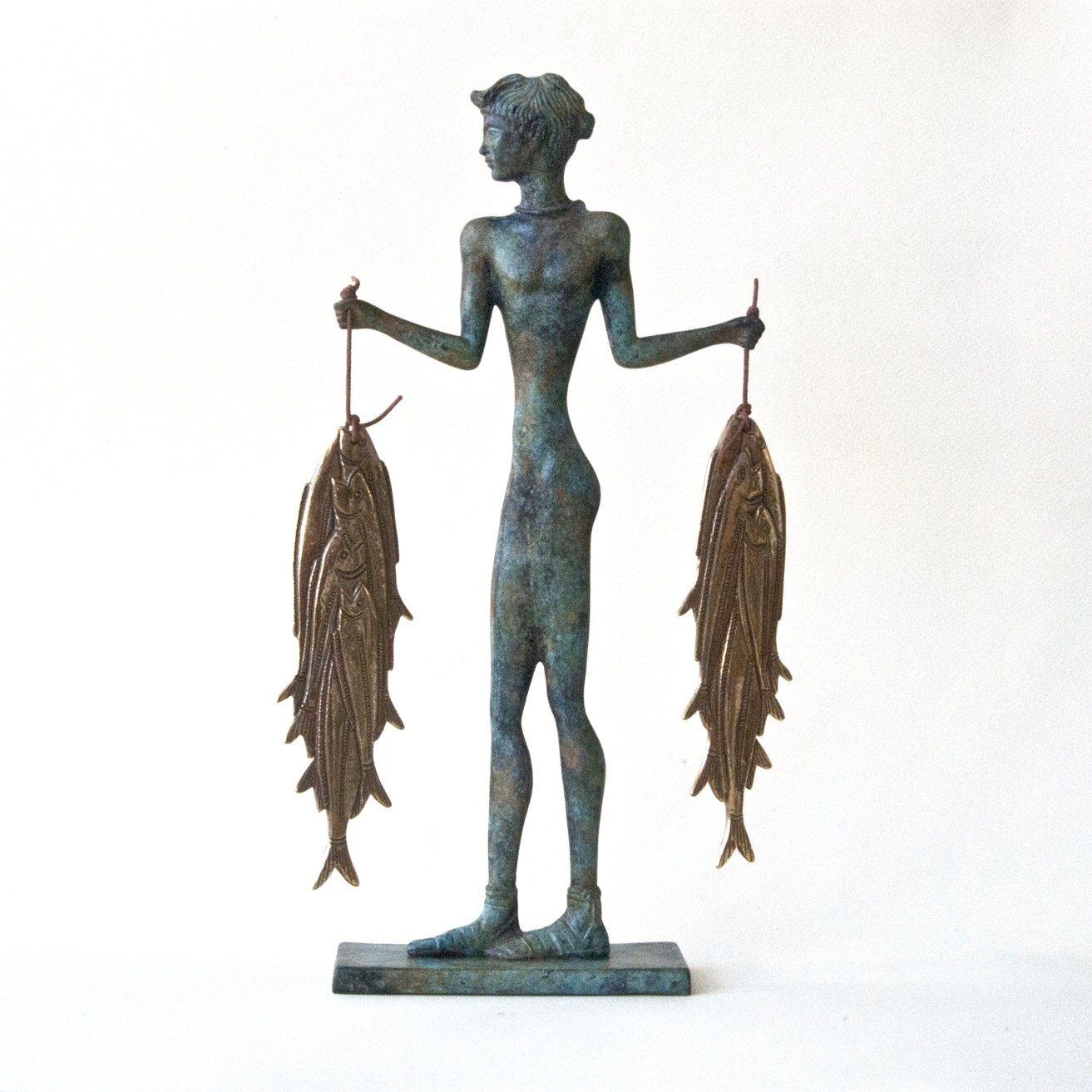 Fisherman Holding a Bunch of Fish, Akrotiri Santorini, Greece