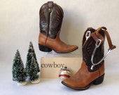 vintage child's cowboy boots, paired with spurs and a flashcard ...