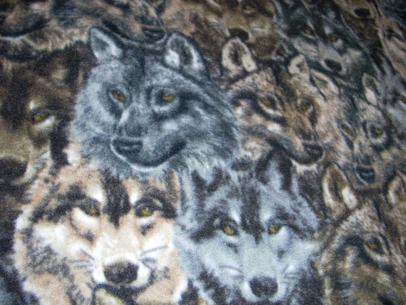 Fleece Fabric Packed wolves wolf faces 59 wide