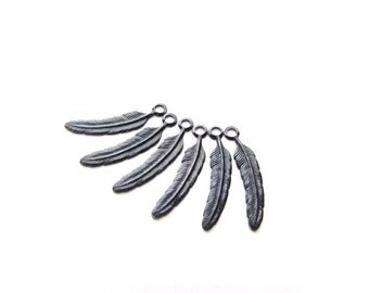 Token feather | Etsy