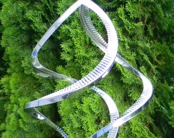 Handmade stainless steel wind spinners by WindOrnaments on Etsy