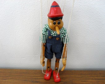 Wooden pinocchio | Etsy
