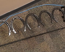 Popular items for horseshoe boot rack on Etsy
