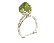 Popular items for rough cut peridot on Etsy