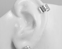 Unique faux conch earring related items | Etsy