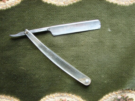 Vintage Barber's Straight Razor with clear plastic handle