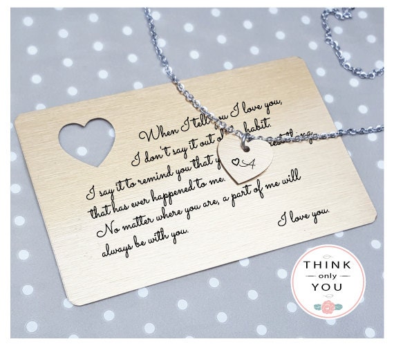 Wallet insert card with Heart Cut Out necklace.