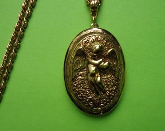 Angel locket | Etsy