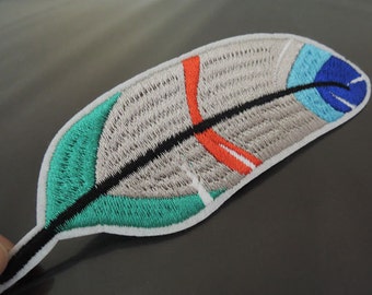 Feather badge | Etsy