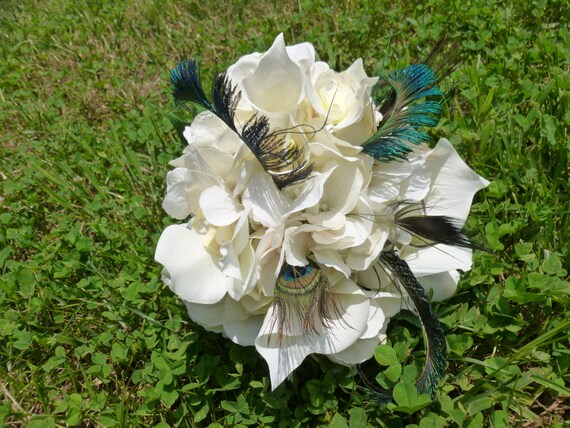 Hydrangea bouquet with peacock feathers for by DressMyWedding