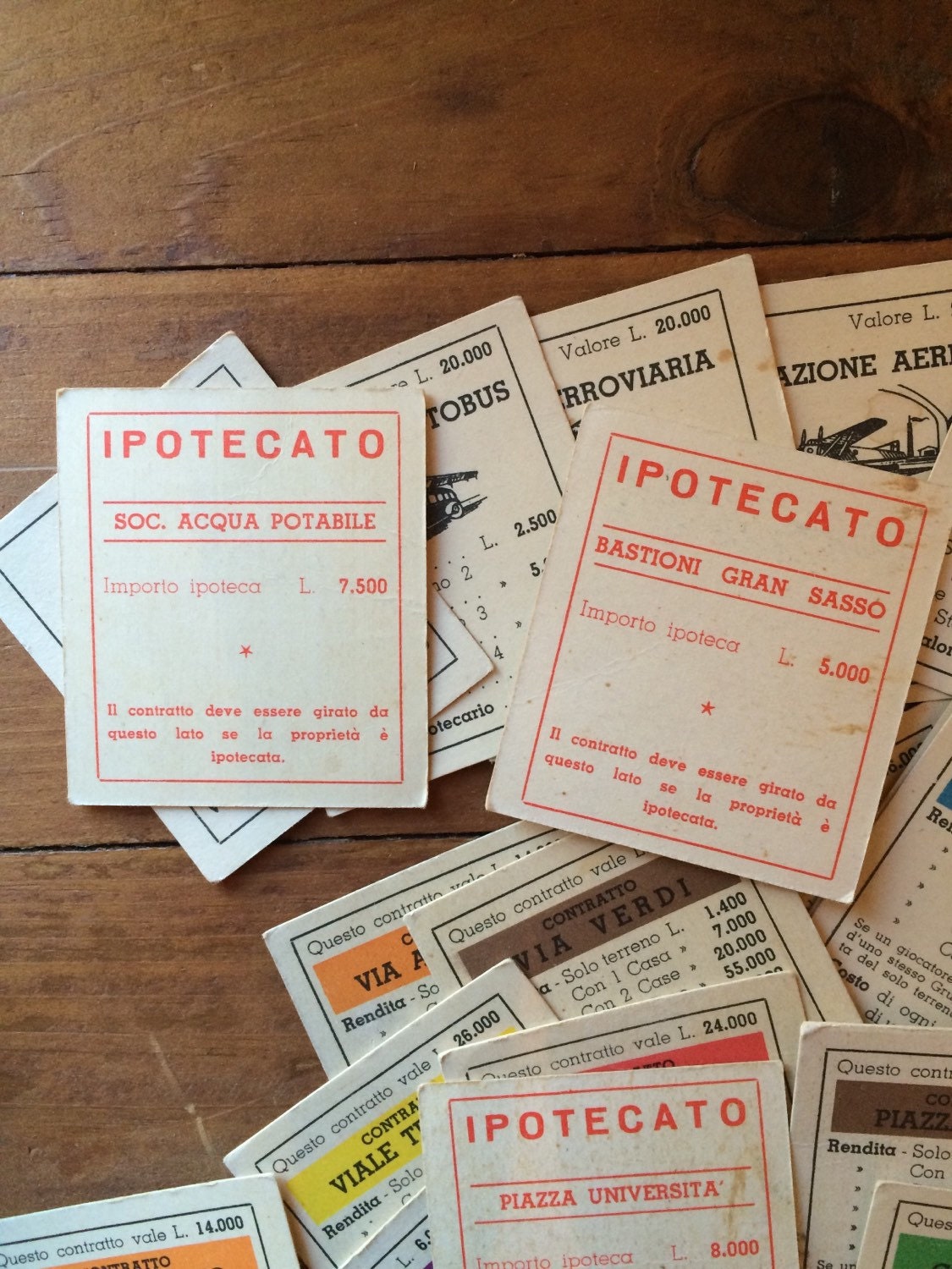 Italian monopoly game cards money and pieces by ForgottenFields