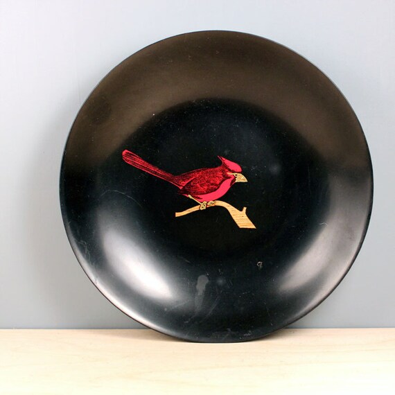 Cardinal. Vintage Couroc of Monterey bowl with bird design. Cardinal. Vintage Couroc of Monterey bowl with bird design.