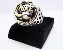 Popular items for nike ring on Etsy