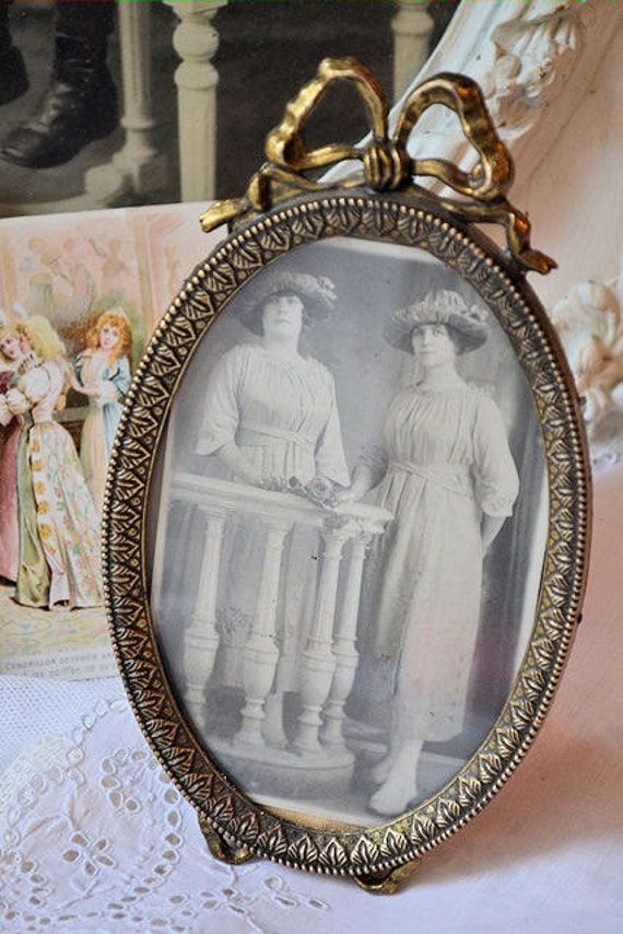 Antique oval ormolu photo frame 1920s