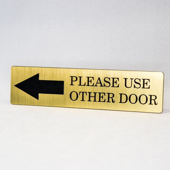 Please Use Other Door Engraved with Arrow Home Store or