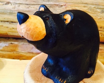 Chainsaw carved rail bear