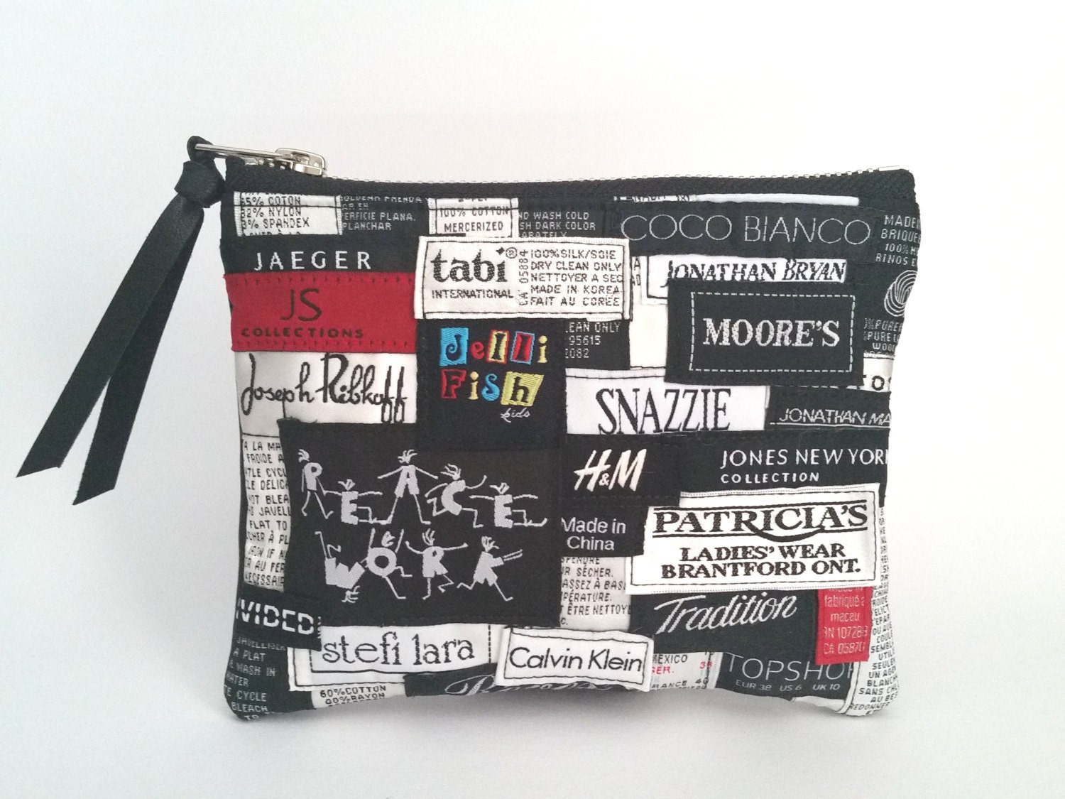 UPCYCLED Label Pouch. Recycled Clothing Labels. Leather Change