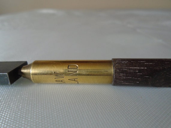 Shaw vintage brass collared glass cutting tool