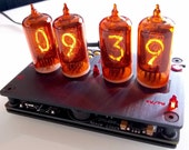 Nixie clocks by betatronics on Etsy