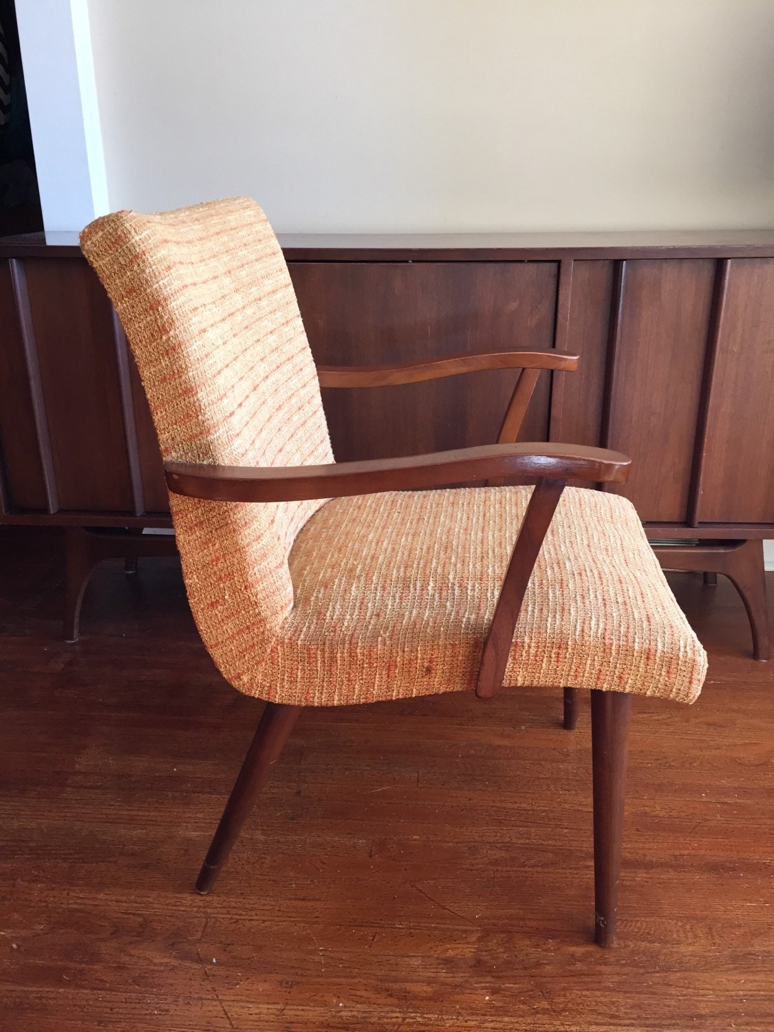 A Mid Century Modern accent chair. – Haute Juice