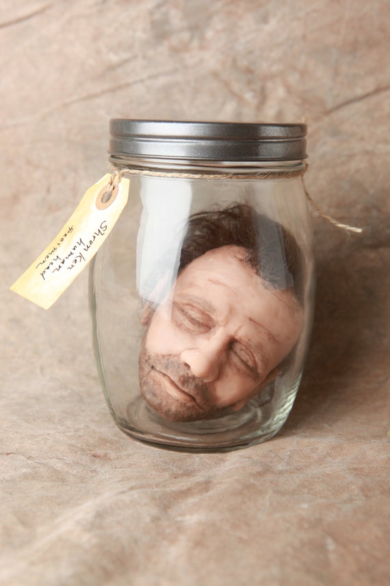 Realistic Shrunken Head specimen in jar by netherworldoddities