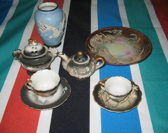 Items similar to Nippon moriage dragonware vase with elephant head ...